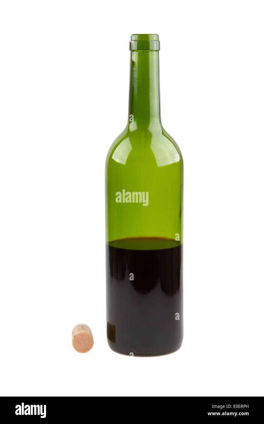 Half empty red wine bottle isolated on white Stock Photo - Alamy