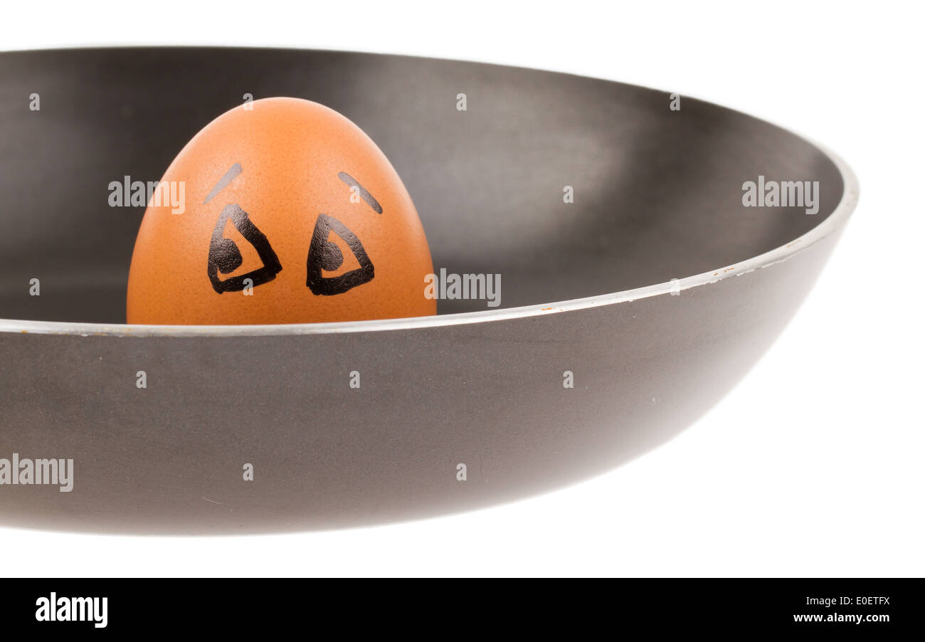 Scared egg, waiting to be fried in a pan, isolated Stock Photo - Alamy