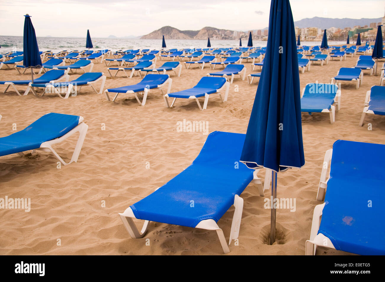 Group sunbeds in sand hi-res stock photography and images - Alamy