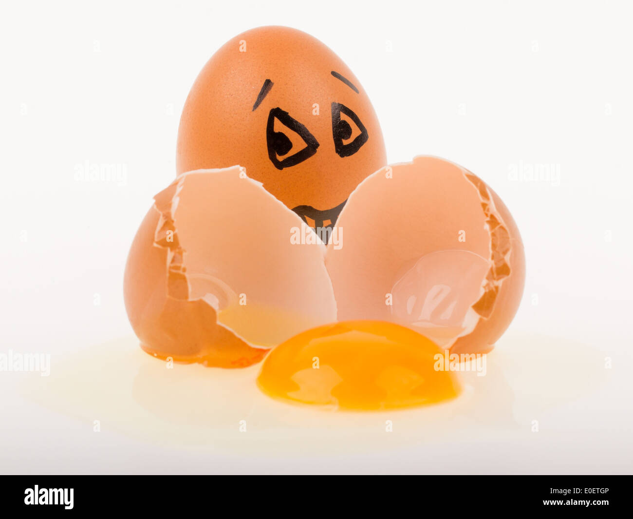 Scared egg looking at it's dead buddy, isolated Stock Photo - Alamy