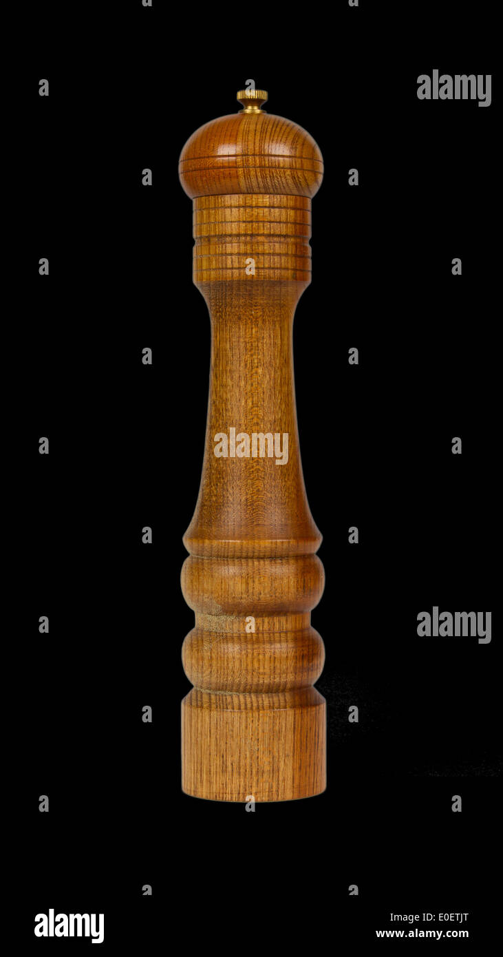 Wood pepper mill isolated on white background Stock Photo - Alamy