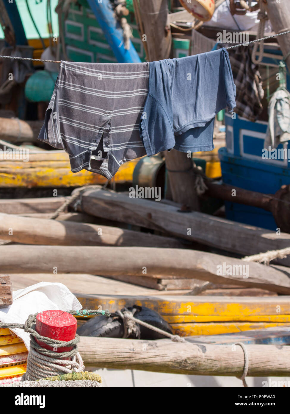 Clothes drying on a washing line in a Vietnamese harbour Stock Photo ...
