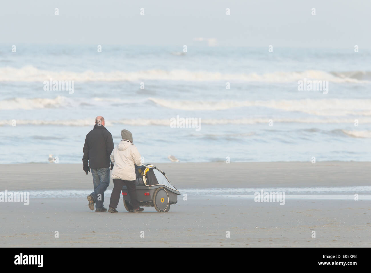 Couple and pushing pram and rear view hi-res stock photography and ...