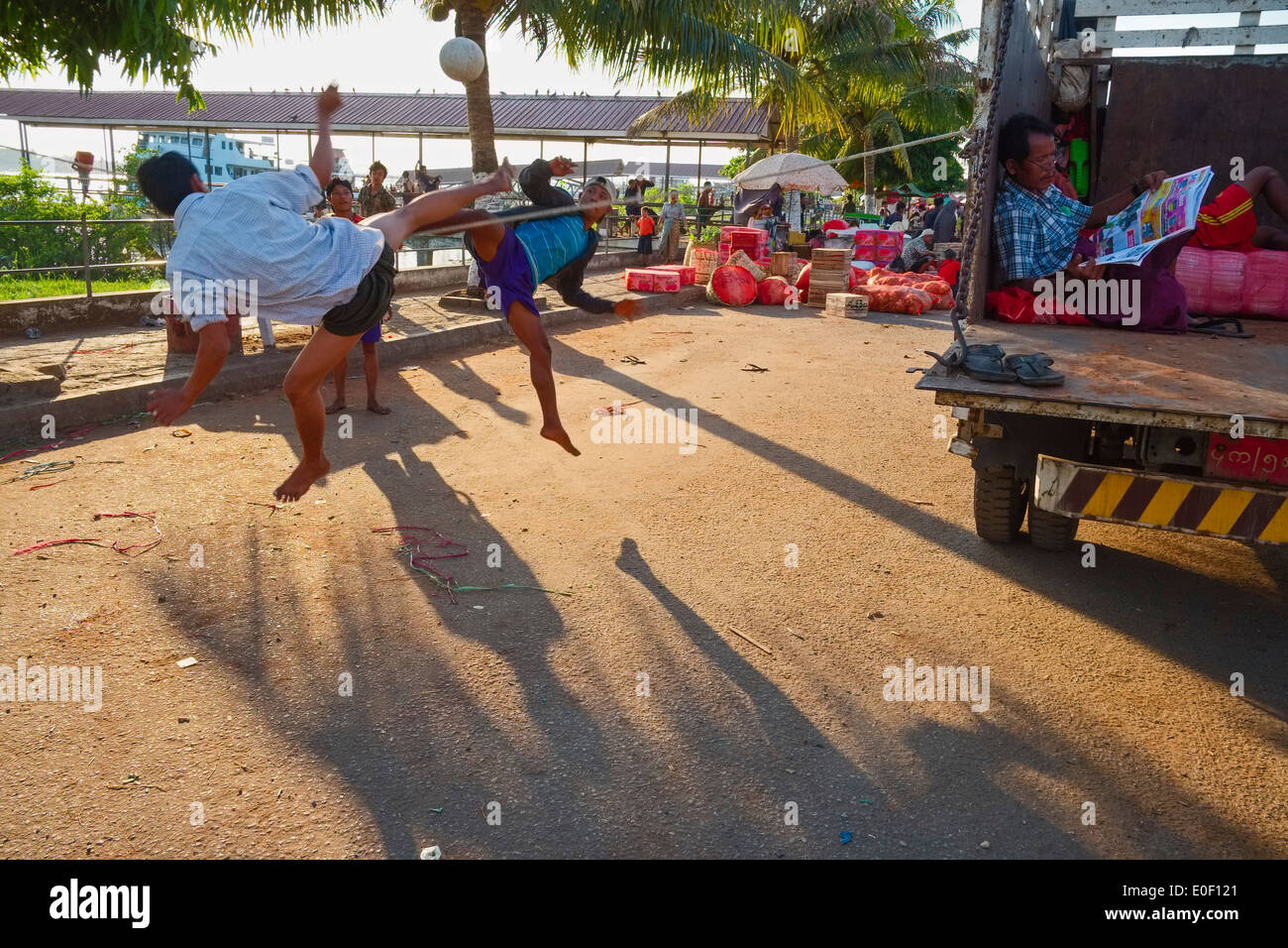 Takraw player at the jetty, Yangon, Myanmar, Asia Stock Photo - Alamy