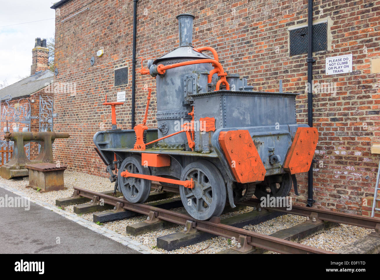 A crude simple 0-4-0 steam locomotive for industrial use name plate ...