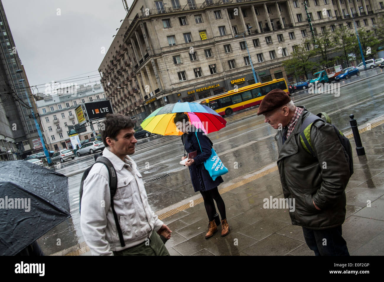 Pedestrians and sidewalk, in the rain, Warsaw, Poland Stock Photo - Alamy