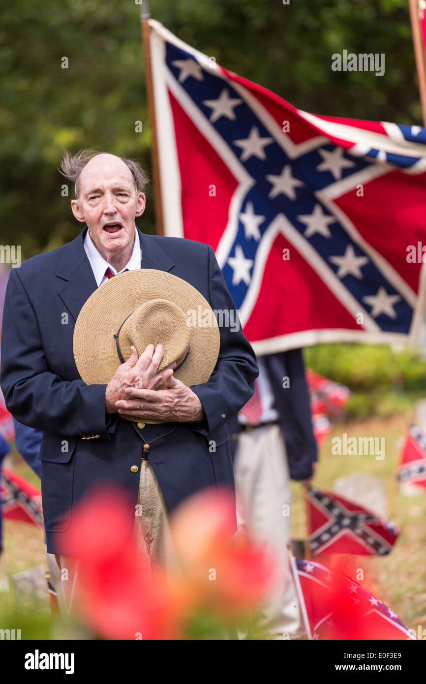 A descendant of Civil War soldiers sings "Dixie" during a ceremony ...
