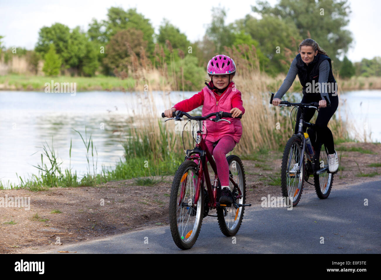 Family river cycling hi-res stock photography and images - Alamy