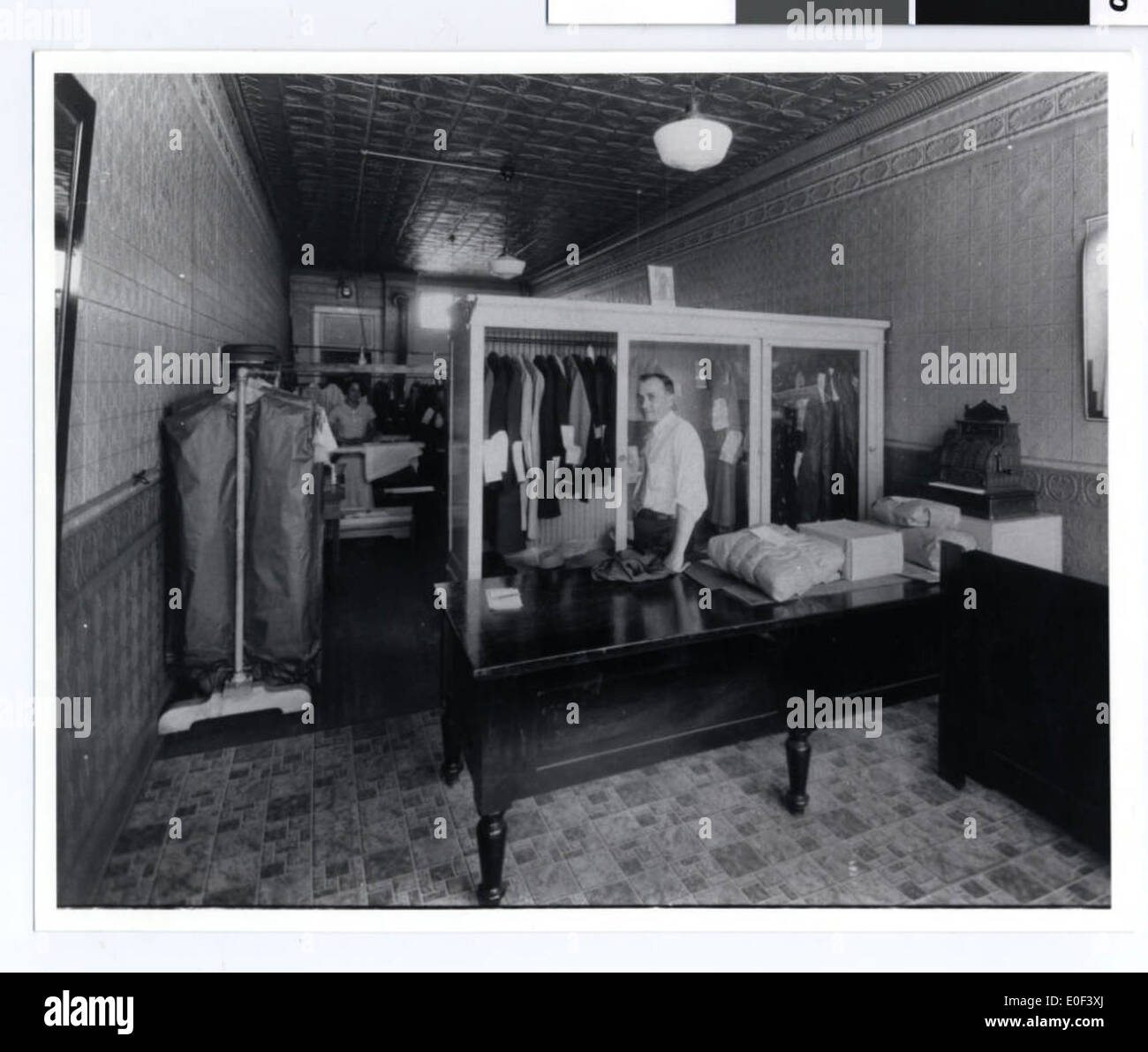 A portrait of Sam Solomon at his dry cleaning business, Master Cleaners ...