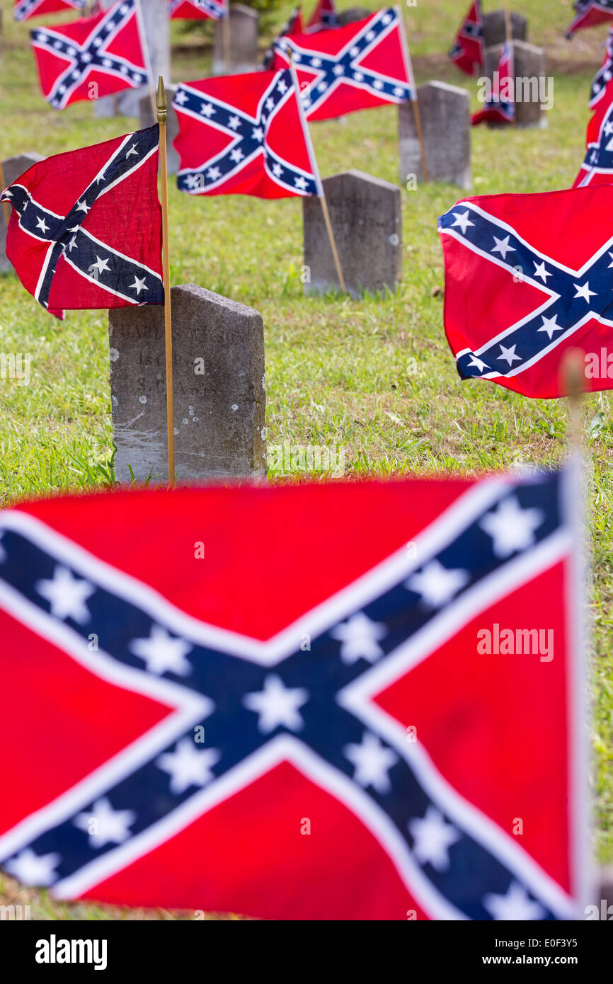 Confederate rebel flags decorate grave markers of soldiers killed in ...