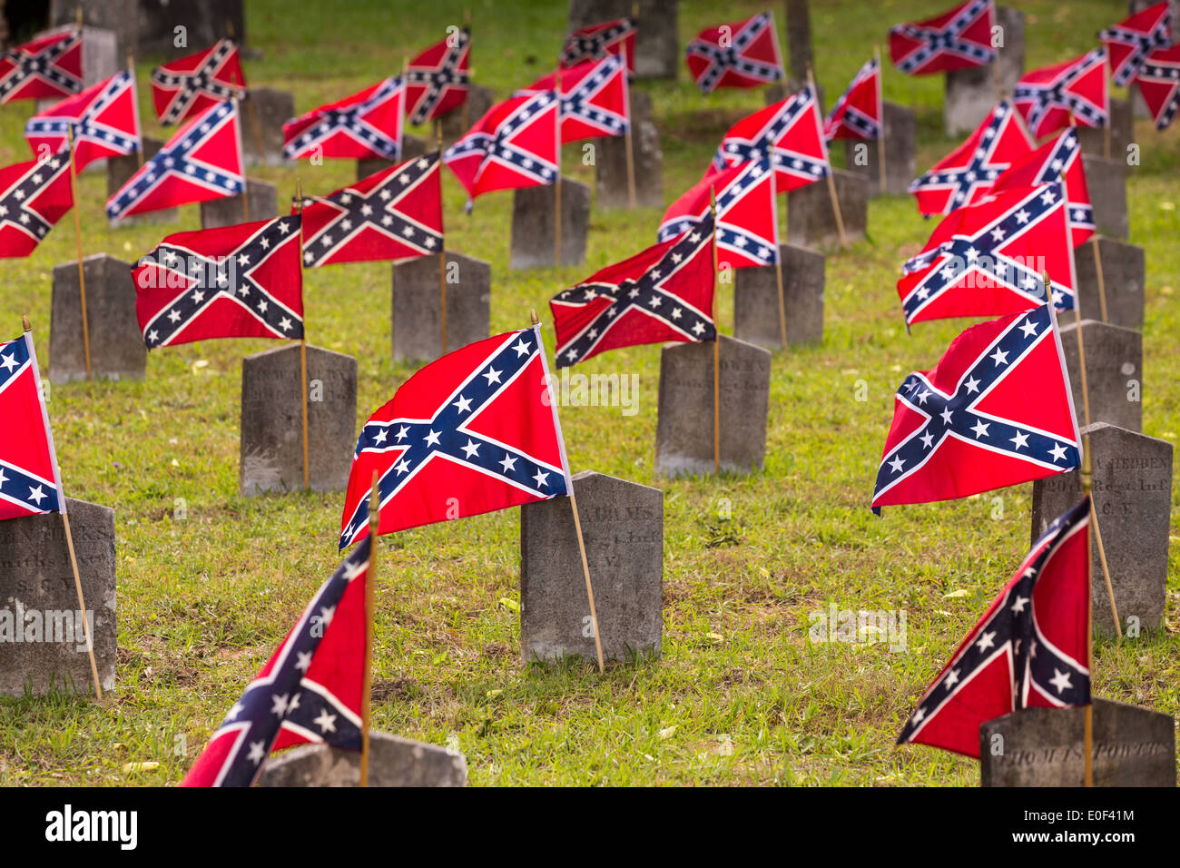 Confederate rebel flags decorate grave markers of soldiers killed in ...