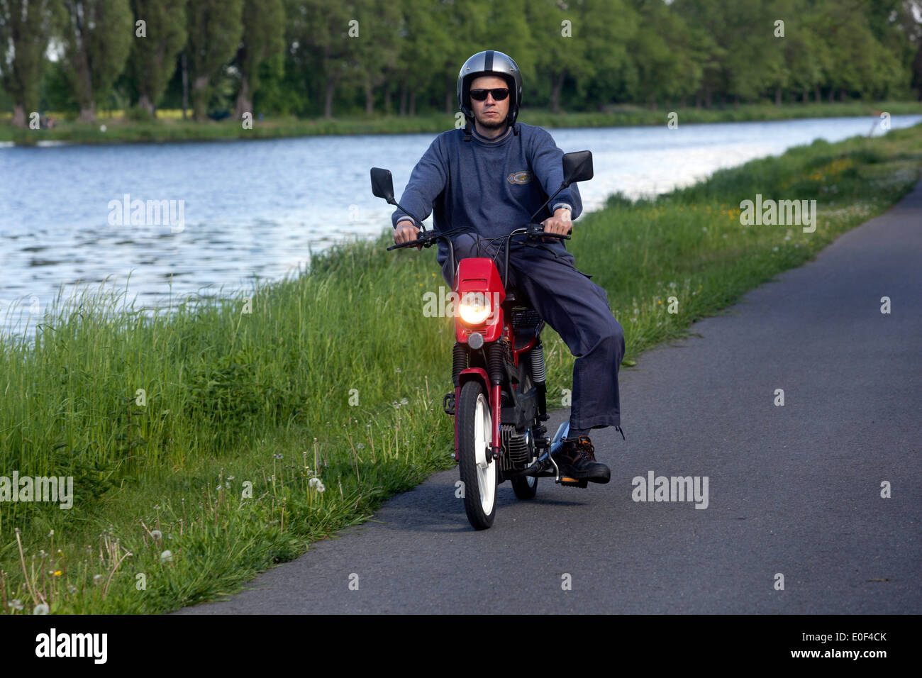 Riding motorcycle helmet country road hi-res stock photography and ...