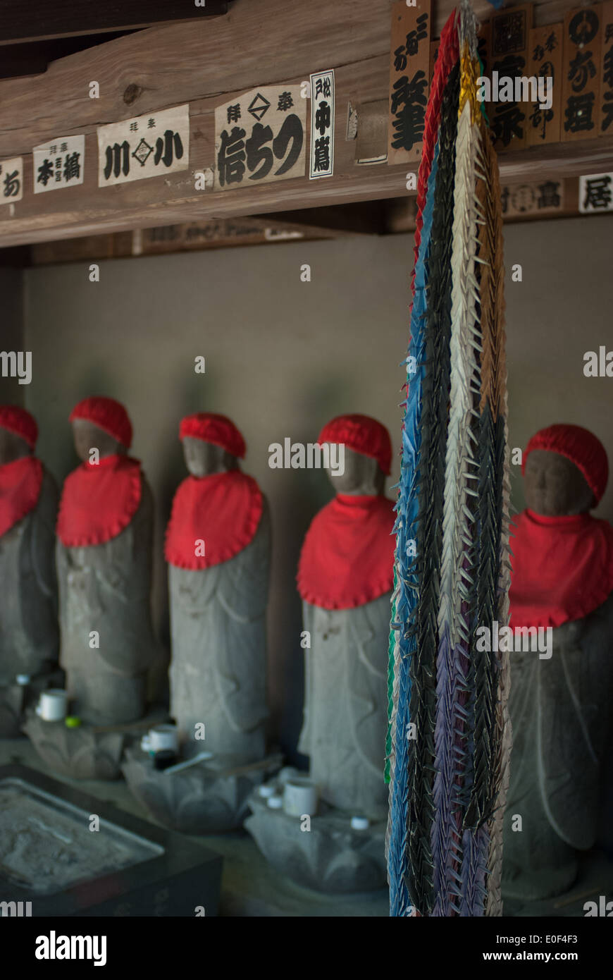 stone statues at a temple in Tokyo, Japan Stock Photo - Alamy