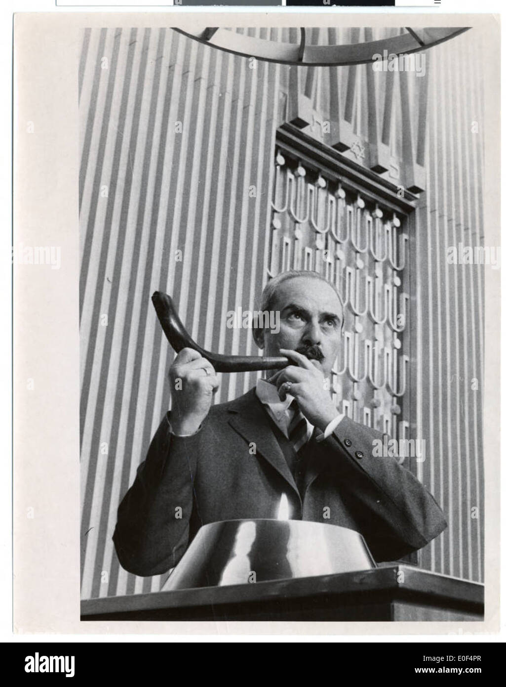 A photograph of Willard Fineberg blowing the shofar at Mount Zion ...