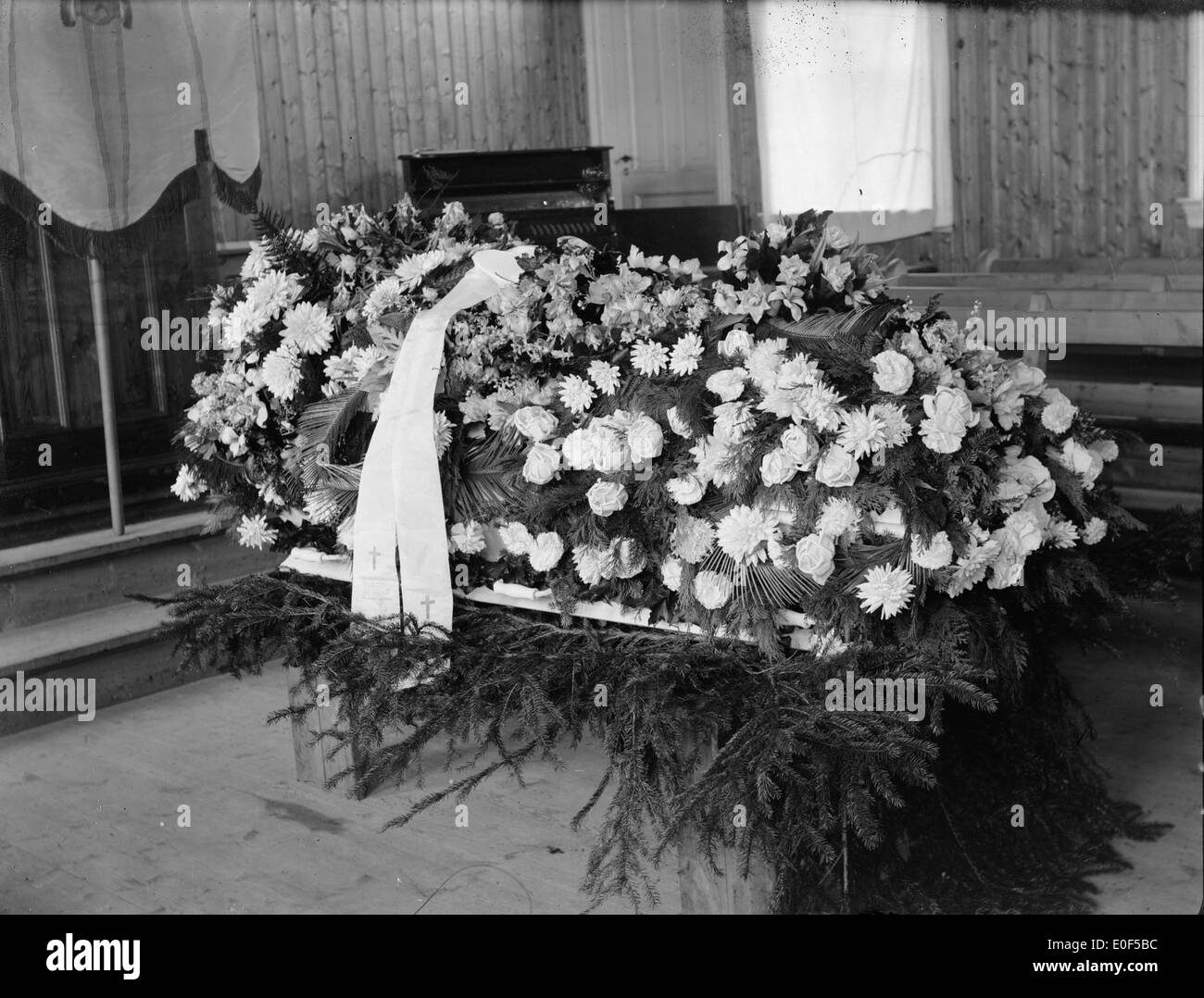 Black Casket With Flowers