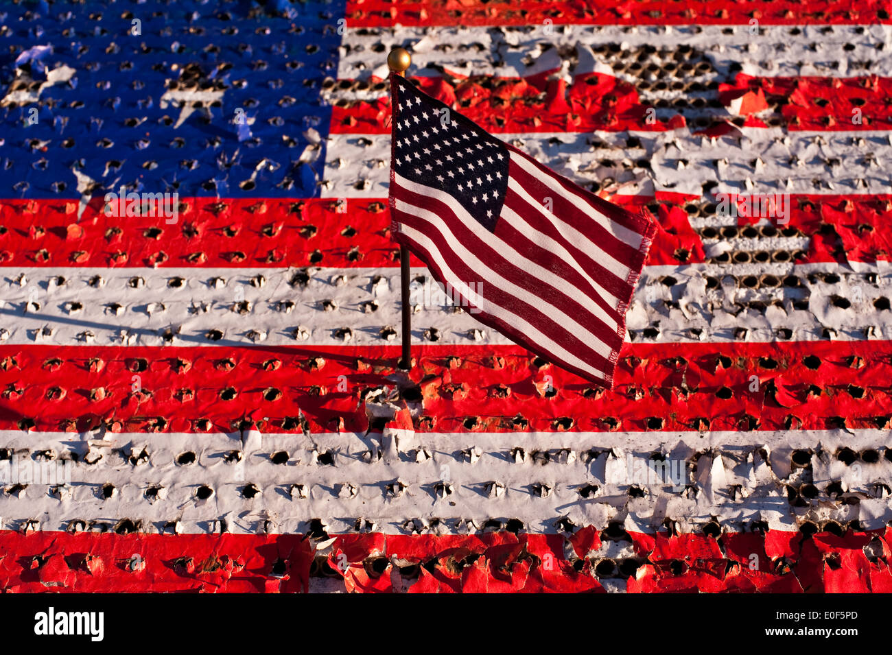 Fourth of July with American flag damaged by fireworks Stock Photo - Alamy