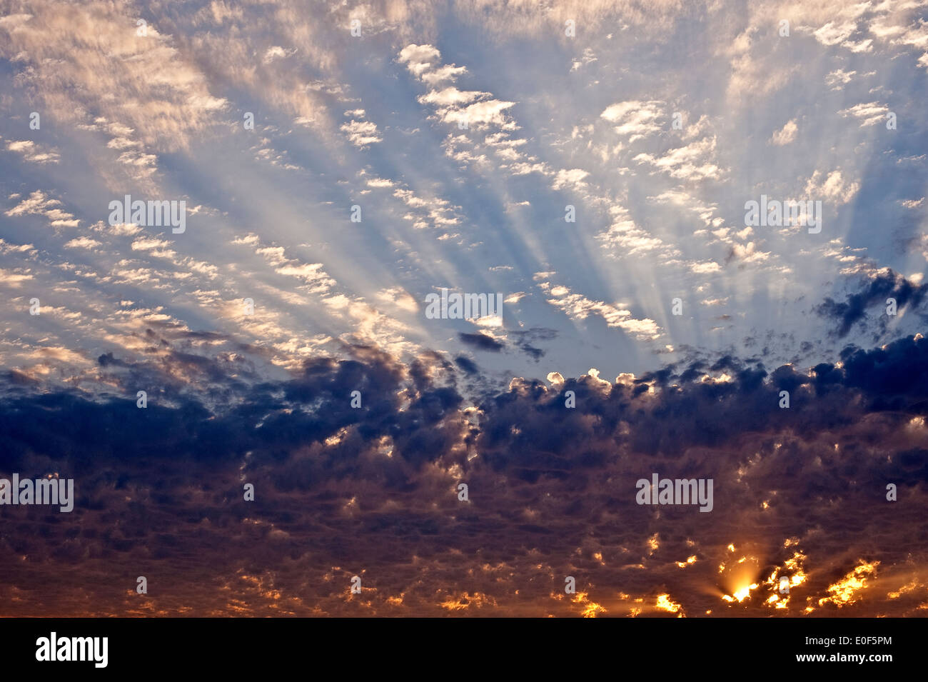 Sunset clouds sun rays hi-res stock photography and images - Alamy