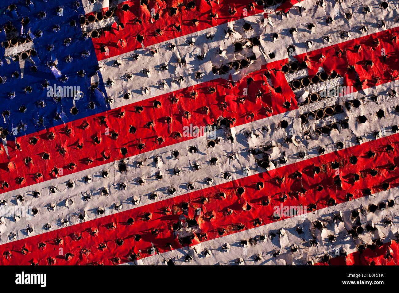 Fourth of July with American flag damaged by fireworks Stock Photo - Alamy