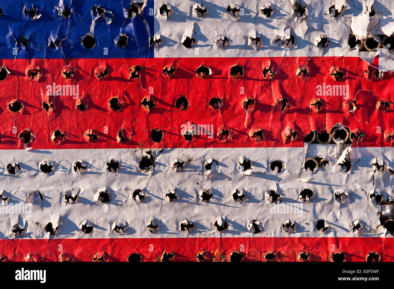 Fourth of July with American flag damaged by fireworks Stock Photo - Alamy