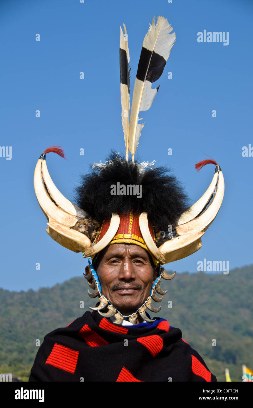 Hornbill heads as head decoration of Naga warrior man Stock Photo - Alamy