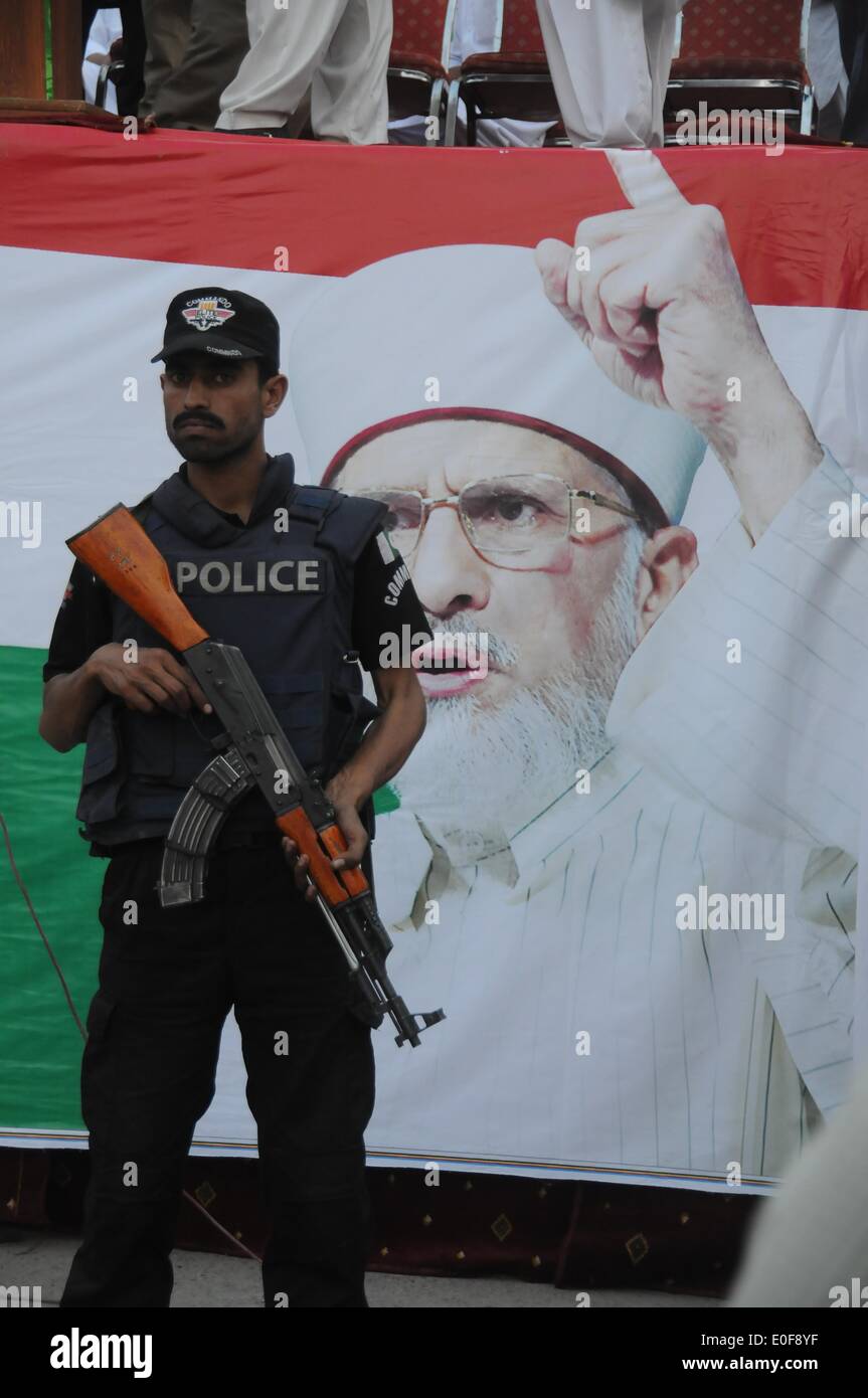 Rawalpindi, Pakistan. 11th May, 2014. A Pakistani policeman stands ...