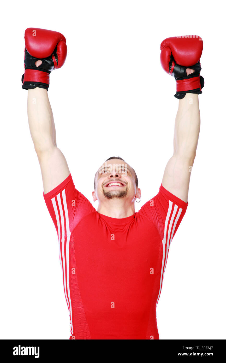 Happy boxer man winner raising arms over white background Stock Photo ...