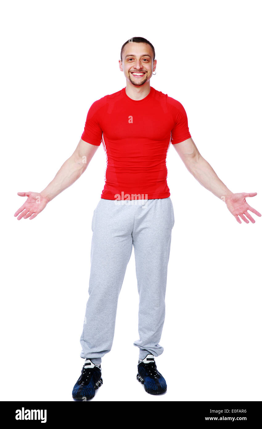 Full length portrait of a cheerful man standing over white background ...