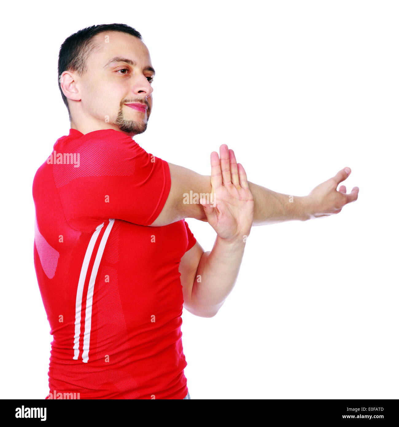 Sports man stretching the arms over a white background Stock Photo - Alamy