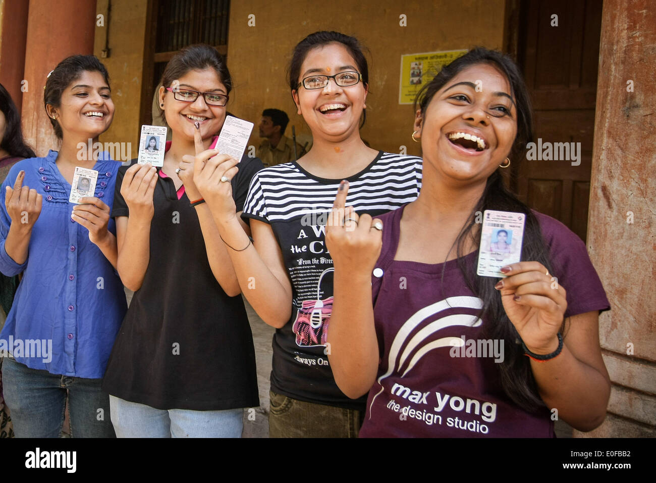 Varanasi, Uttar Pradesh of India. 12th May, 2014. Young women shows ...