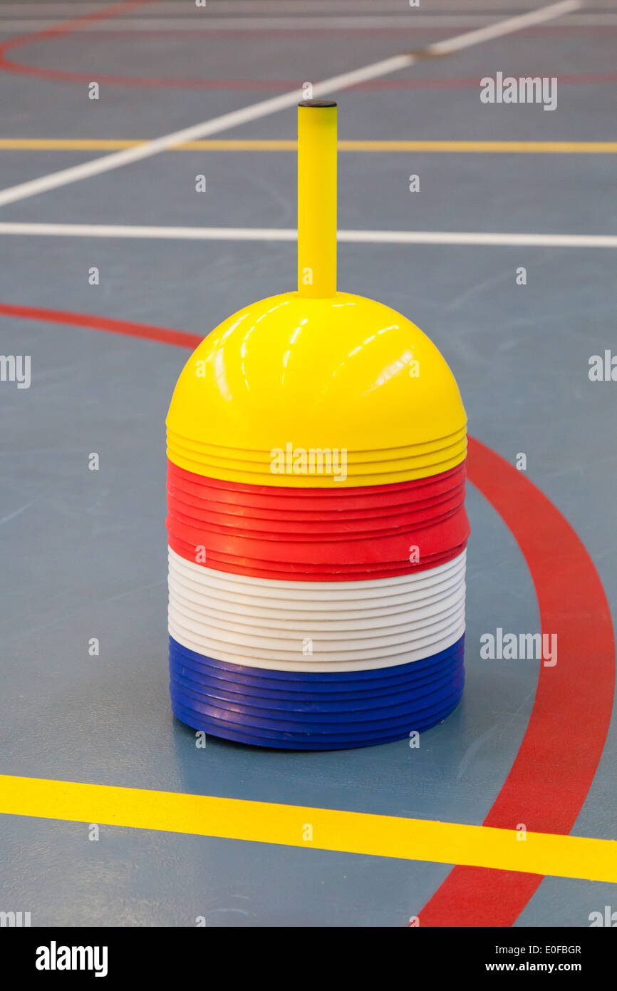 Interior of a gym at school, different colors of cones Stock Photo - Alamy