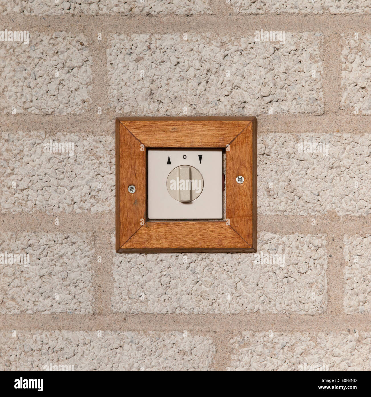 Old switch on a stone wall, isolated Stock Photo - Alamy