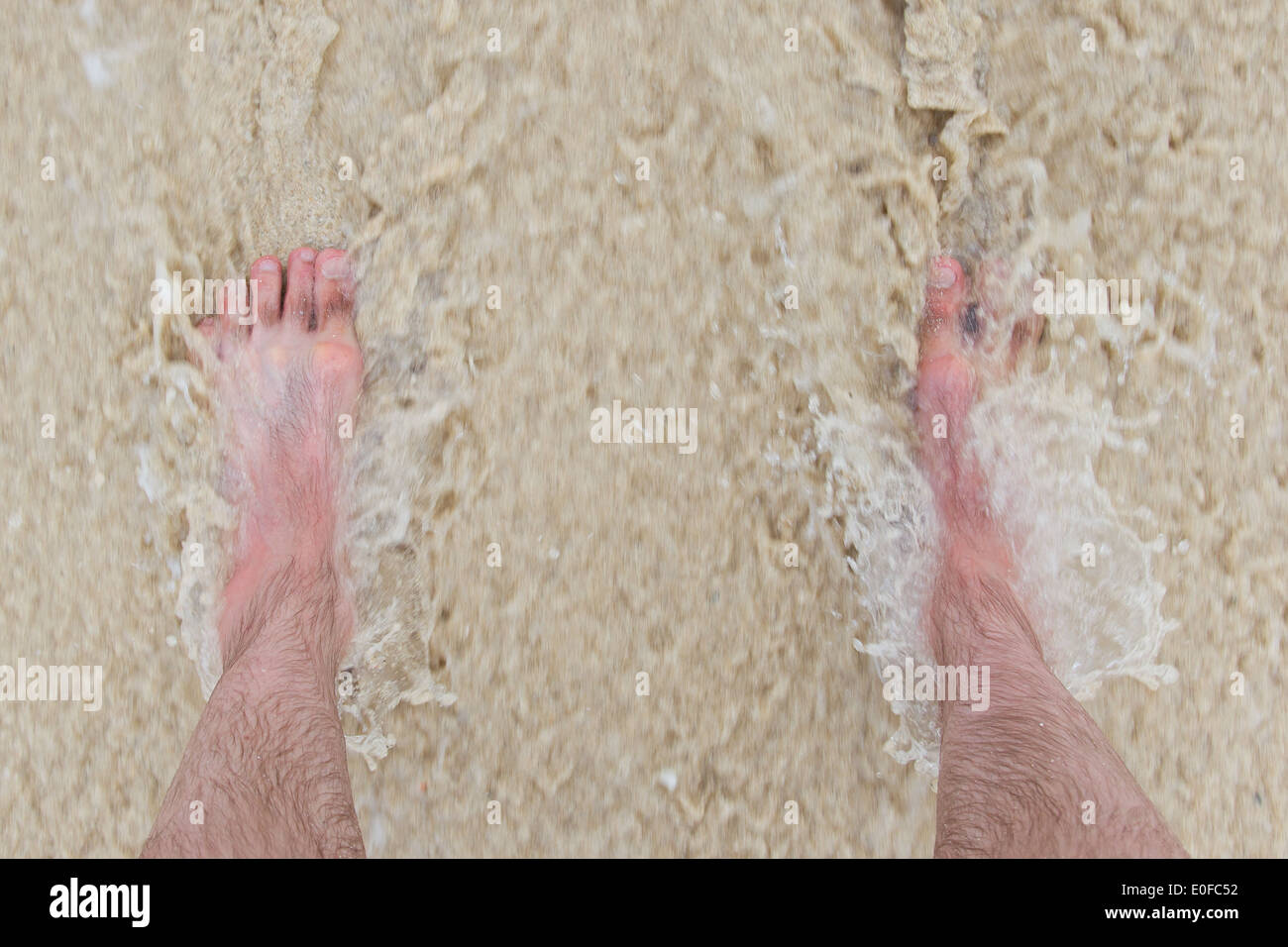 Standing in two feet hi-res stock photography and images - Alamy