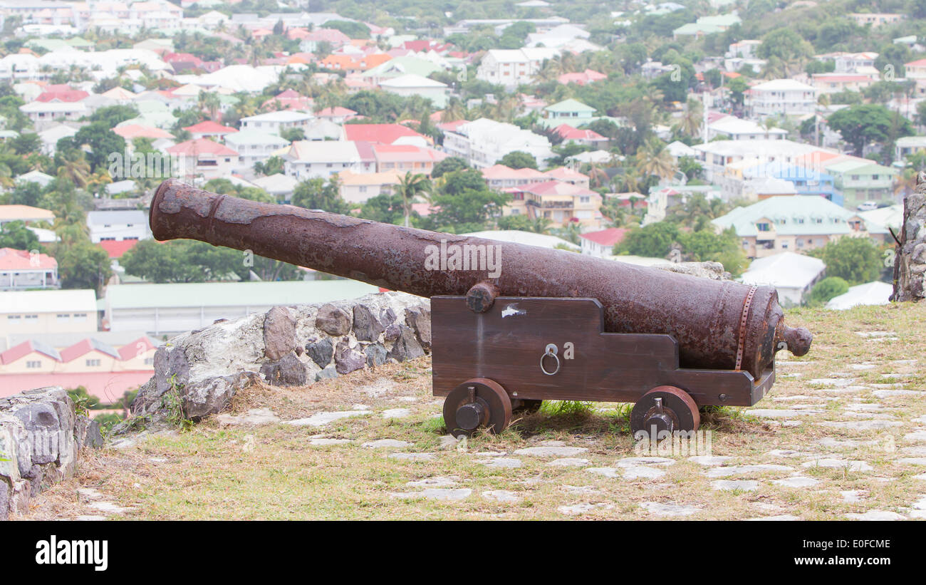 Very old rusted canon on top of an old wall, Caribbean Stock Photo - Alamy