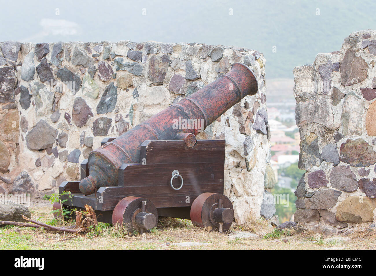 Very old rusted canon on top of an old wall, Caribbean Stock Photo - Alamy
