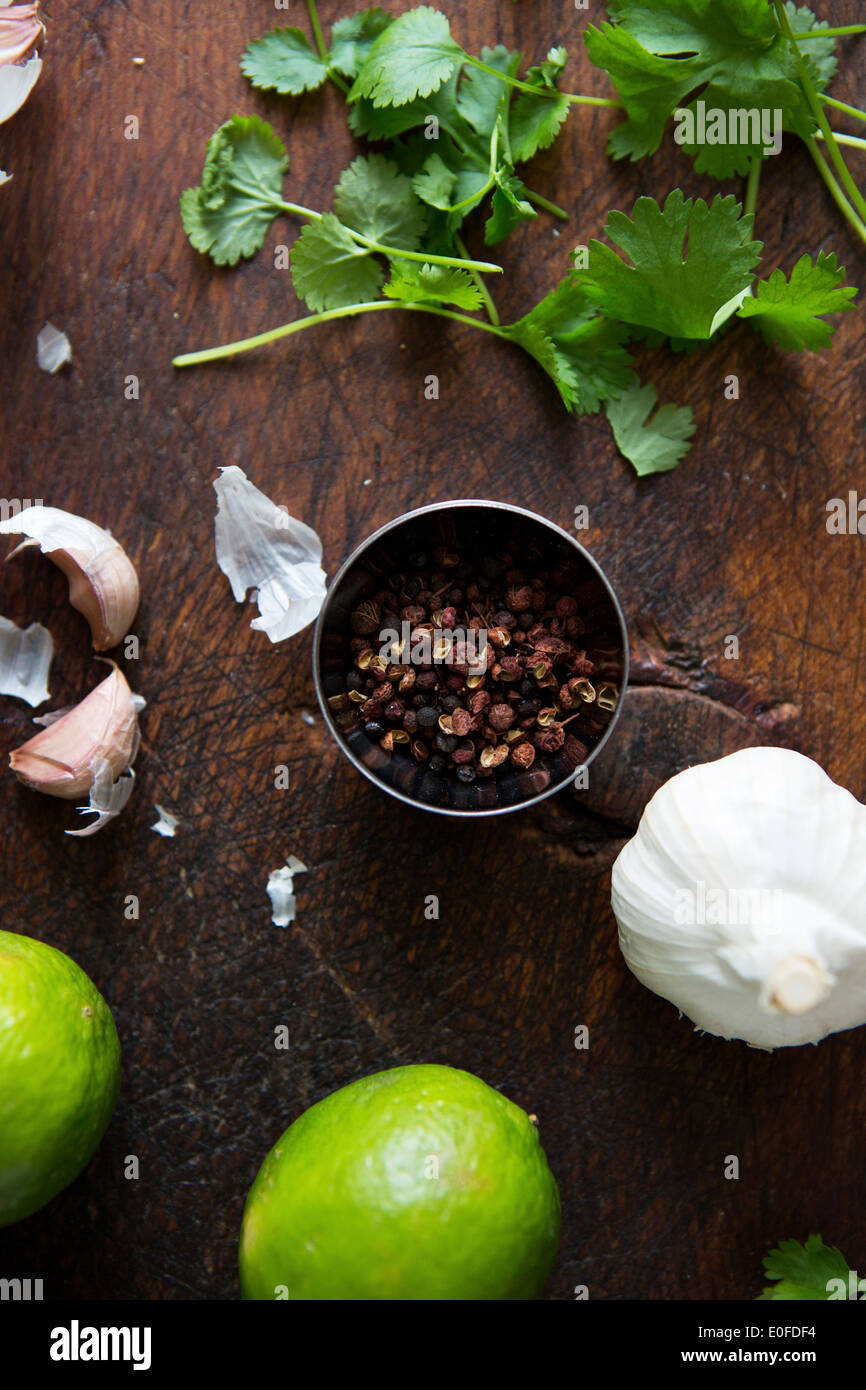 Ingredients. Coriander, lime, garlic, pepper Stock Photo - Alamy