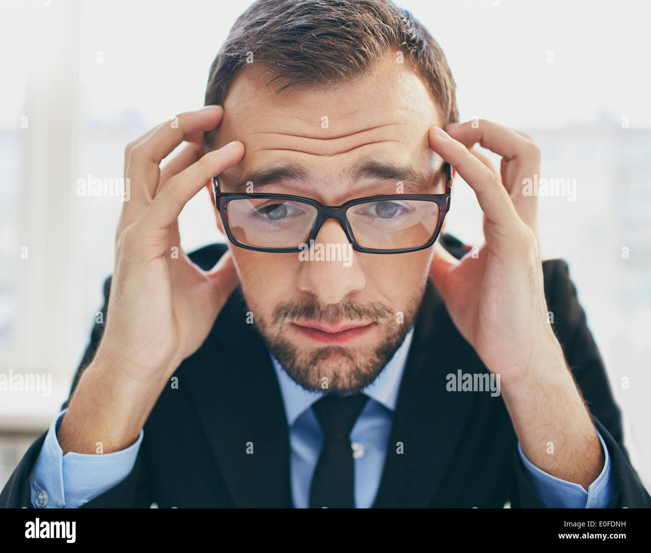 Frustrated frustration guy hand head hi-res stock photography and ...