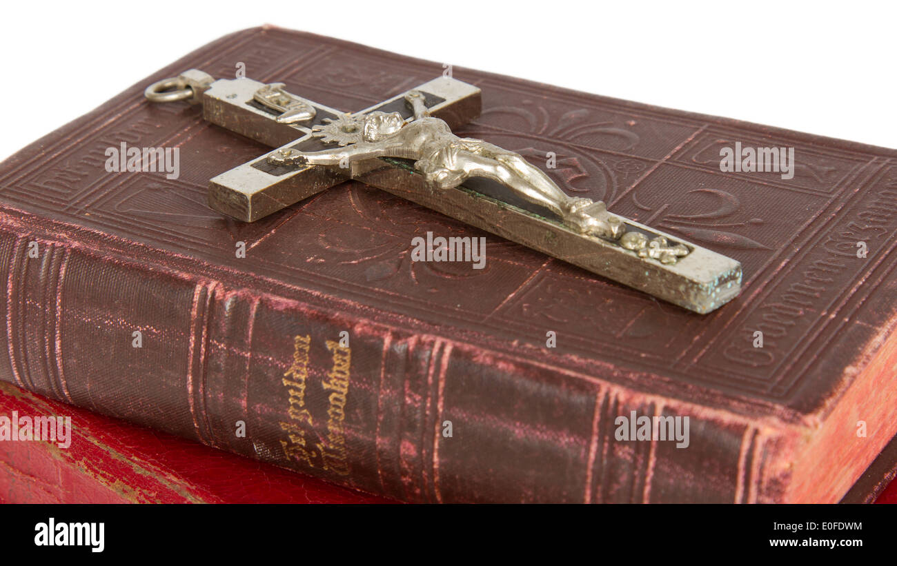 Old antique bible and cross on a white background, isolated Stock Photo ...