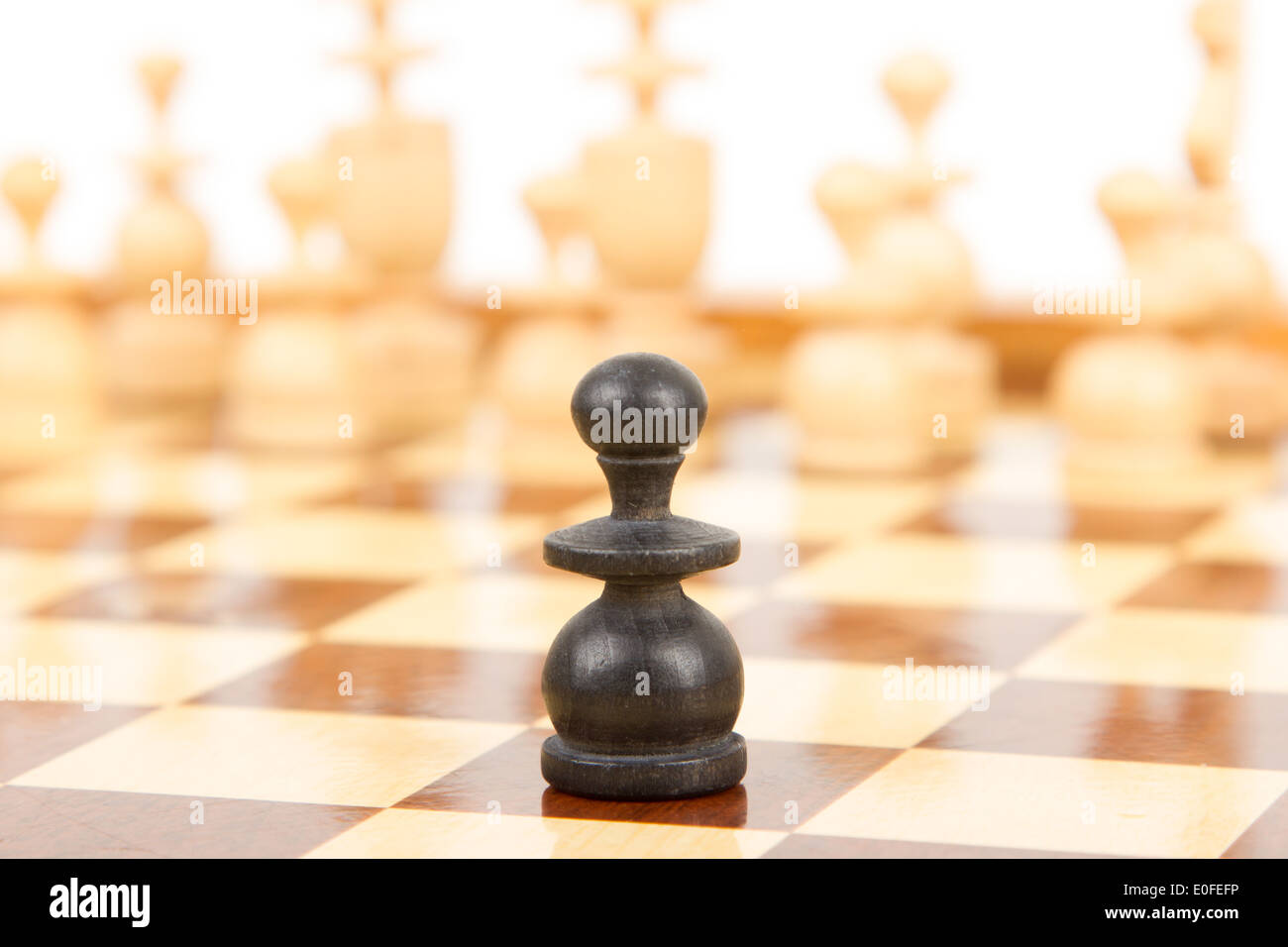 Black chess pawn isolated on a chessboard Stock Photo - Alamy