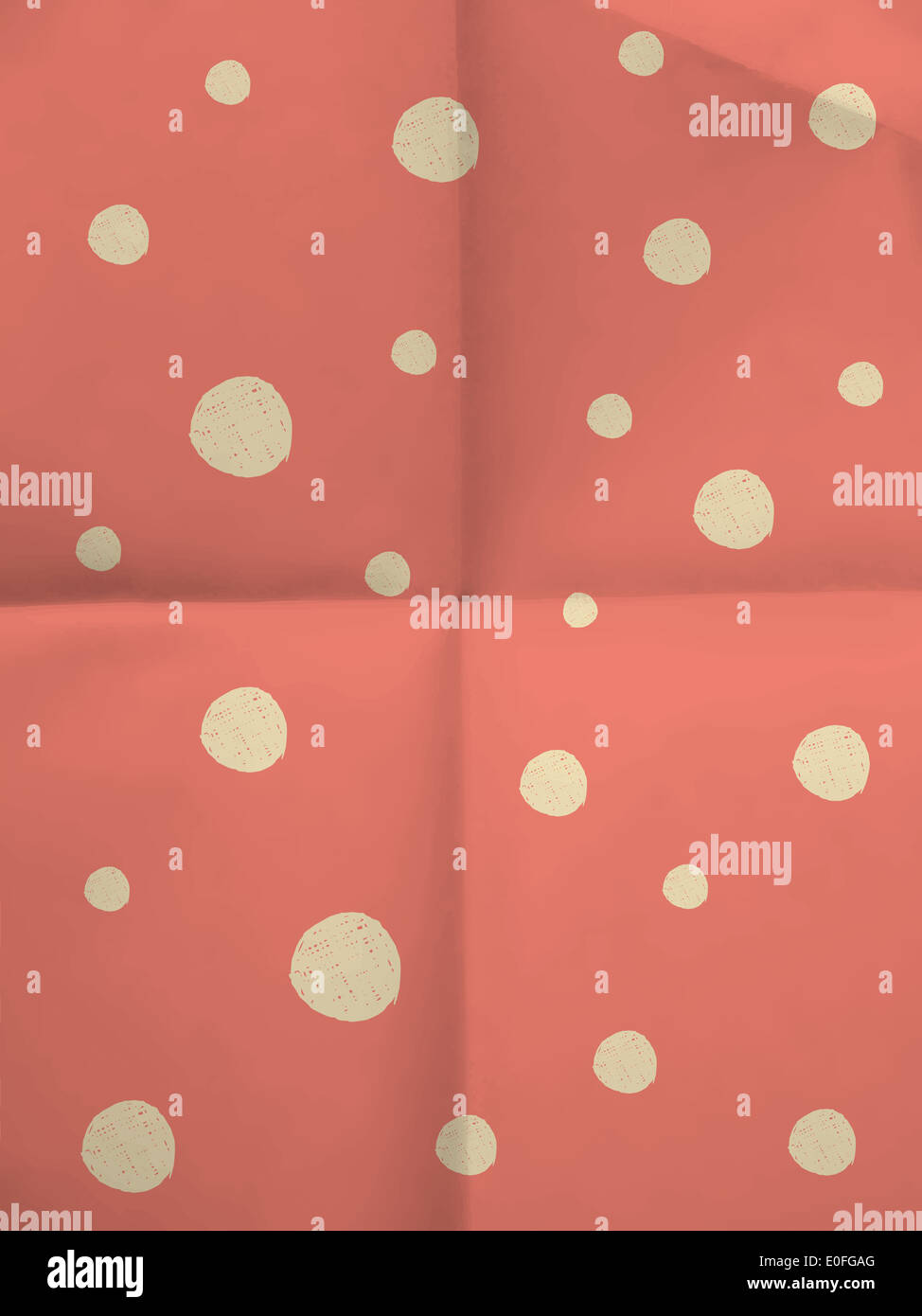 Pink wrapping paper with big white dots on folded in four paper texture ...