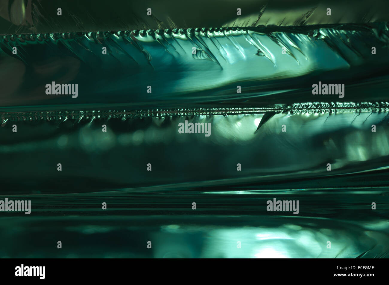 Sharp dangerous edge of plate glass internal reflection brings out ...