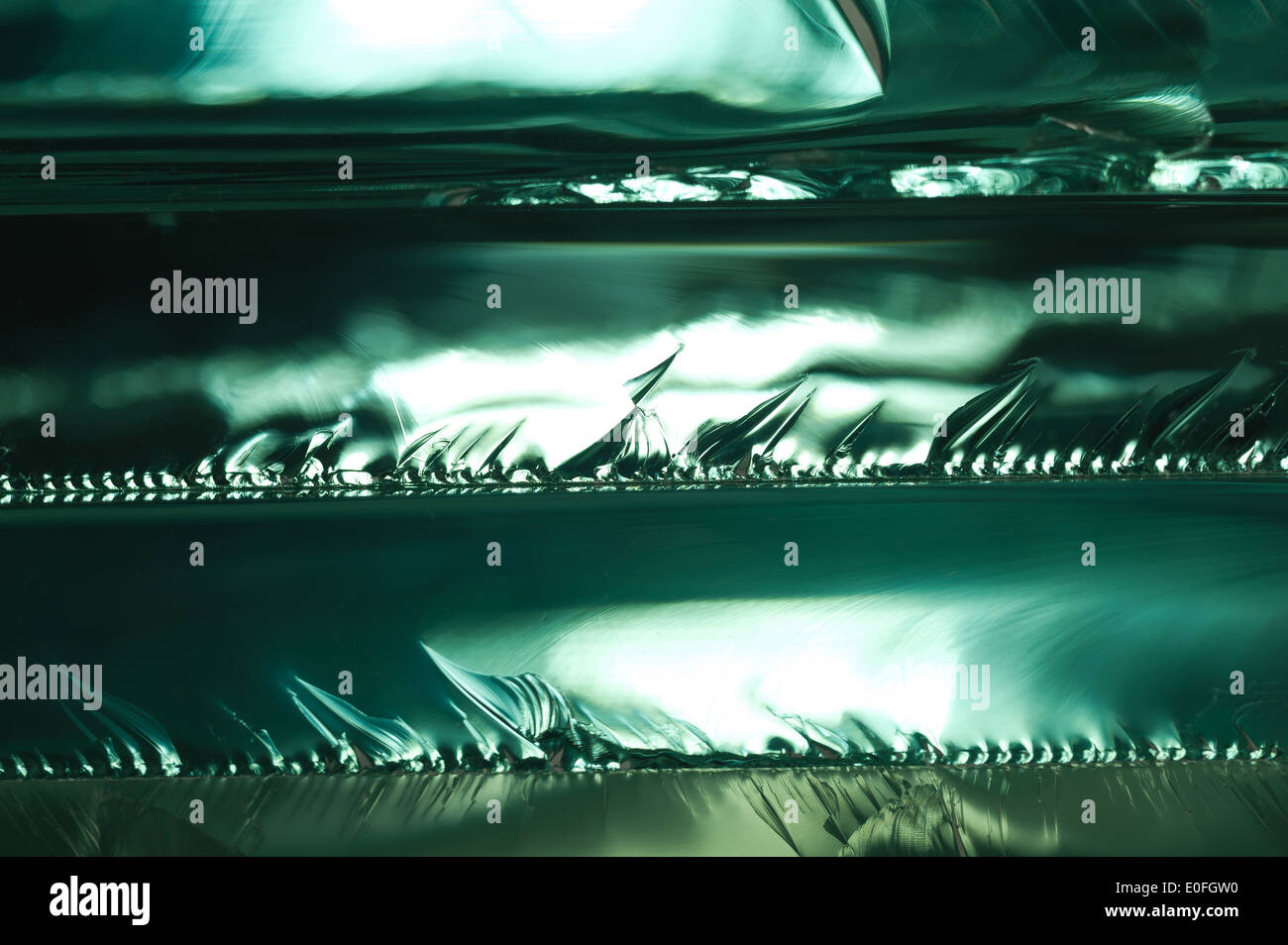Sharp dangerous edge of plate glass internal reflection brings out ...
