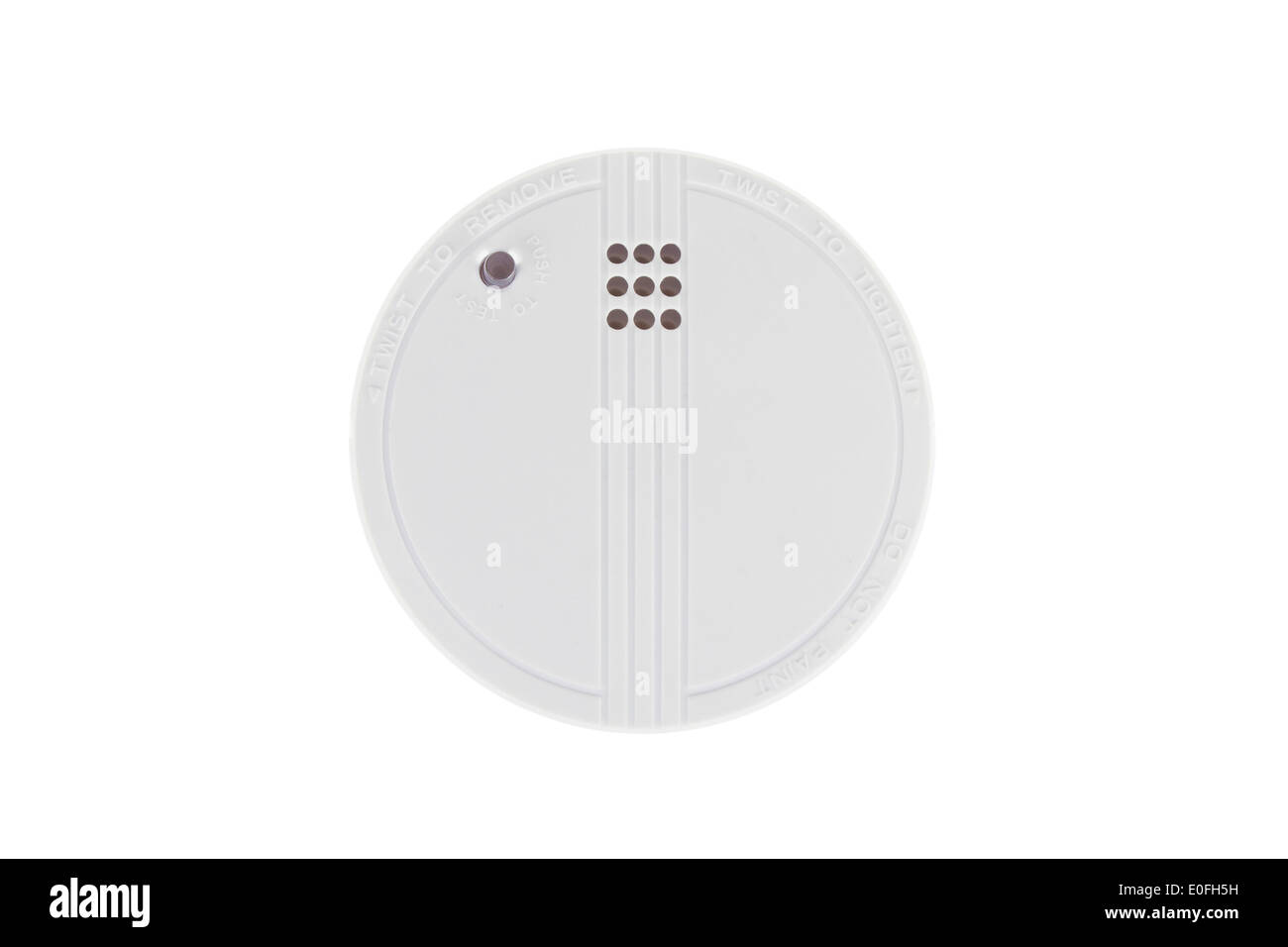 Small round battery operated device to warn residents of fire, isolated ...