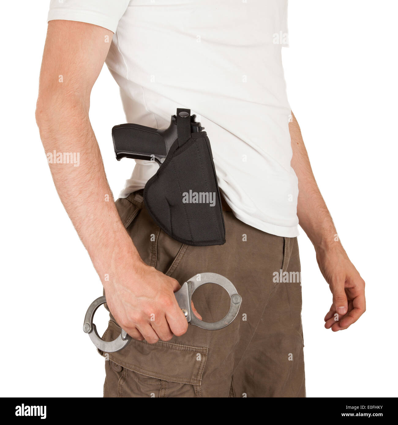 Police handcuffs gun hi-res stock photography and images - Alamy