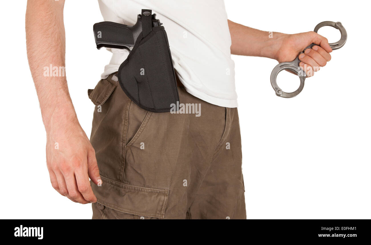 Gun handcuffs hi-res stock photography and images - Alamy