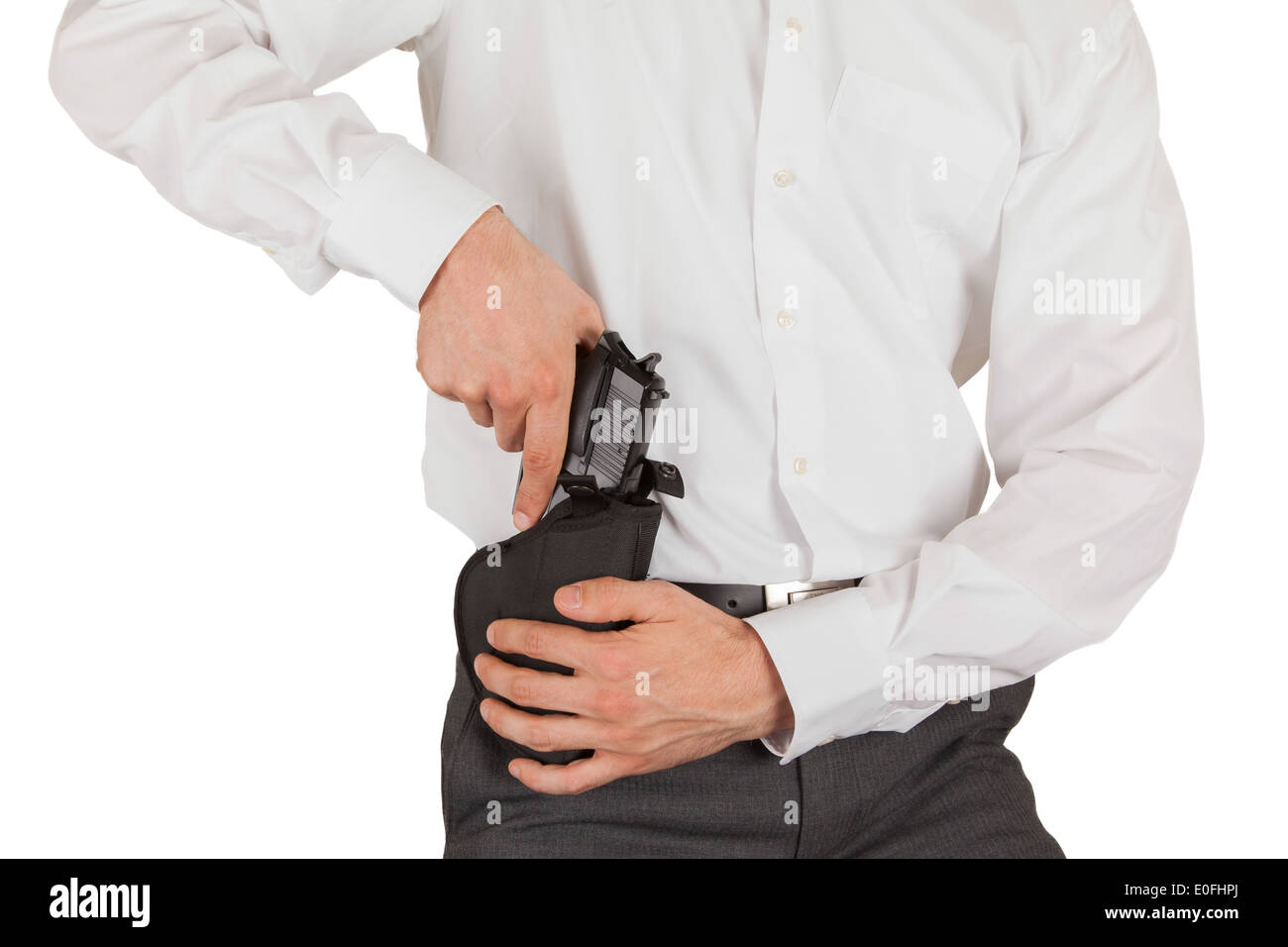 Secret service agent with a gun, isolated on white Stock Photo - Alamy