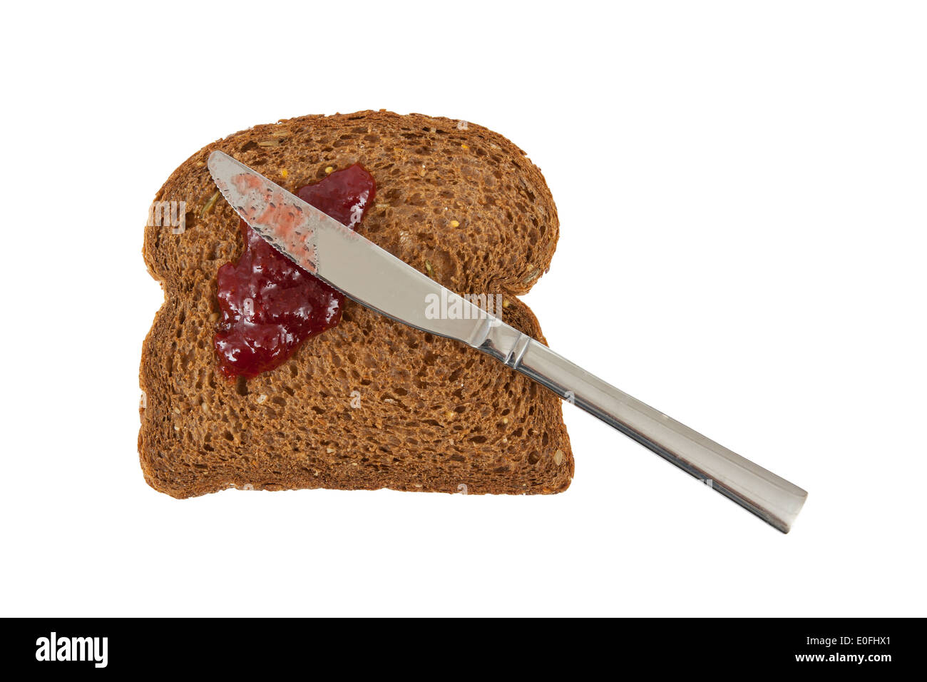 Slice of brown bread with jam isolated on white Stock Photo - Alamy
