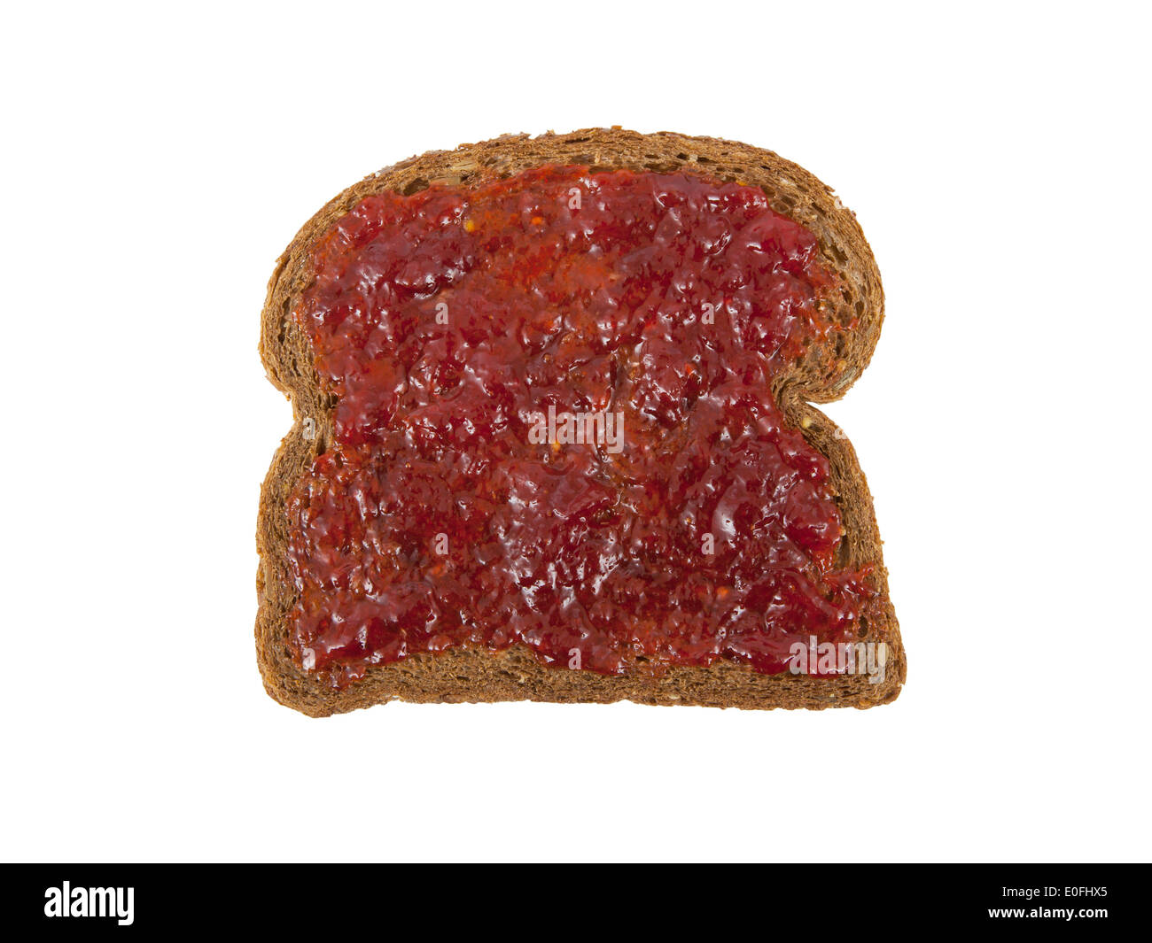 Slice of brown bread with jam isolated on white Stock Photo - Alamy
