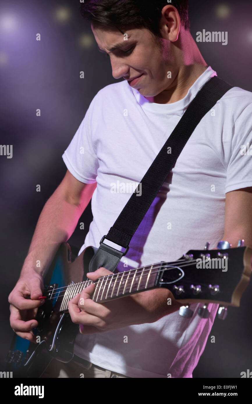 Man playing electric guitar Stock Photo - Alamy