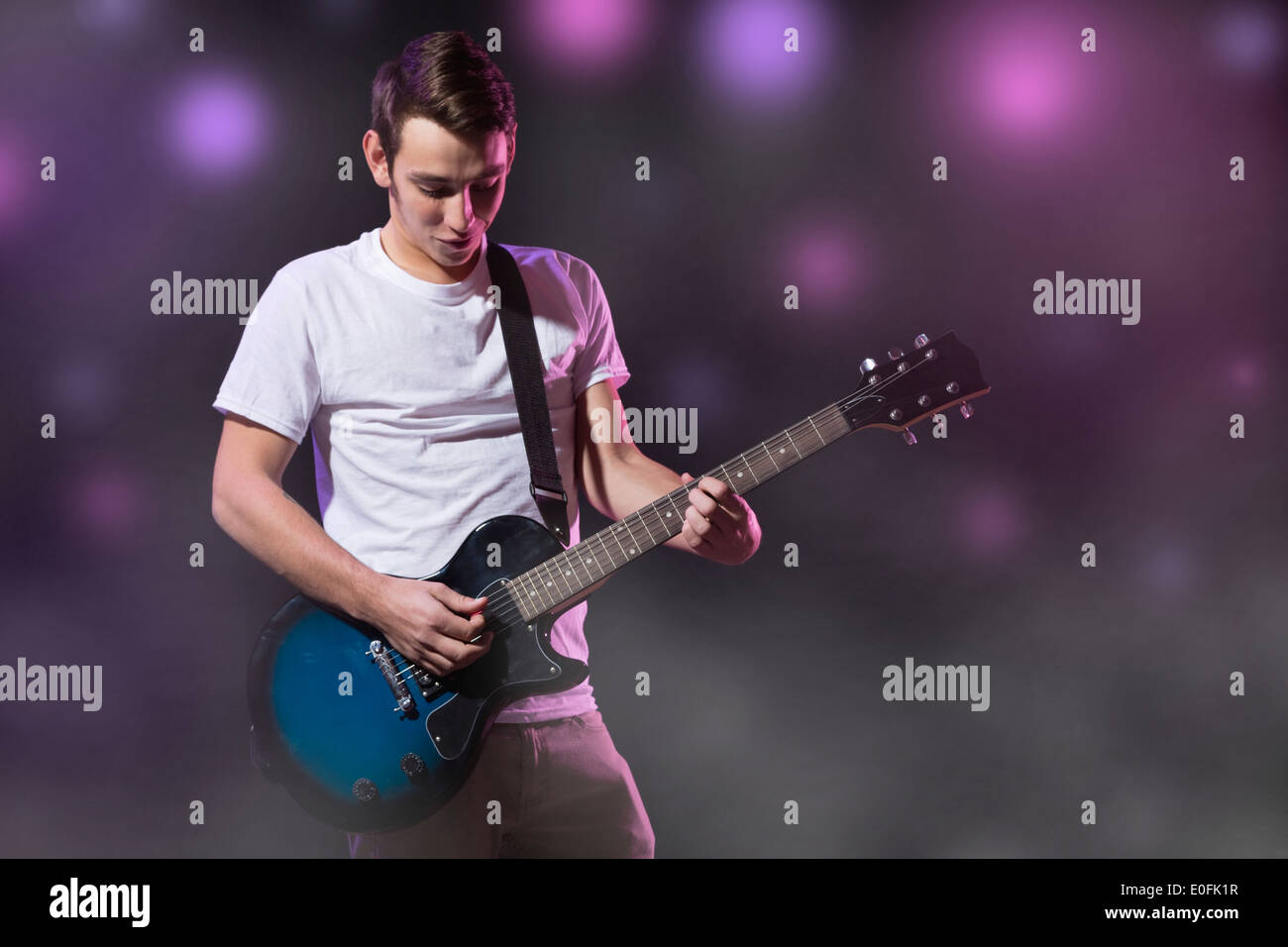 Man playing electric guitar Stock Photo - Alamy