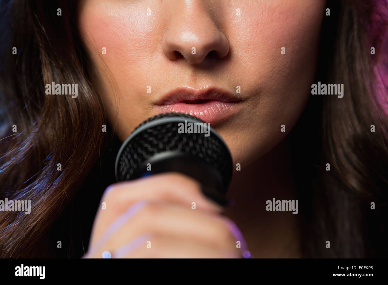 Singer long brown hair hi-res stock photography and images - Alamy